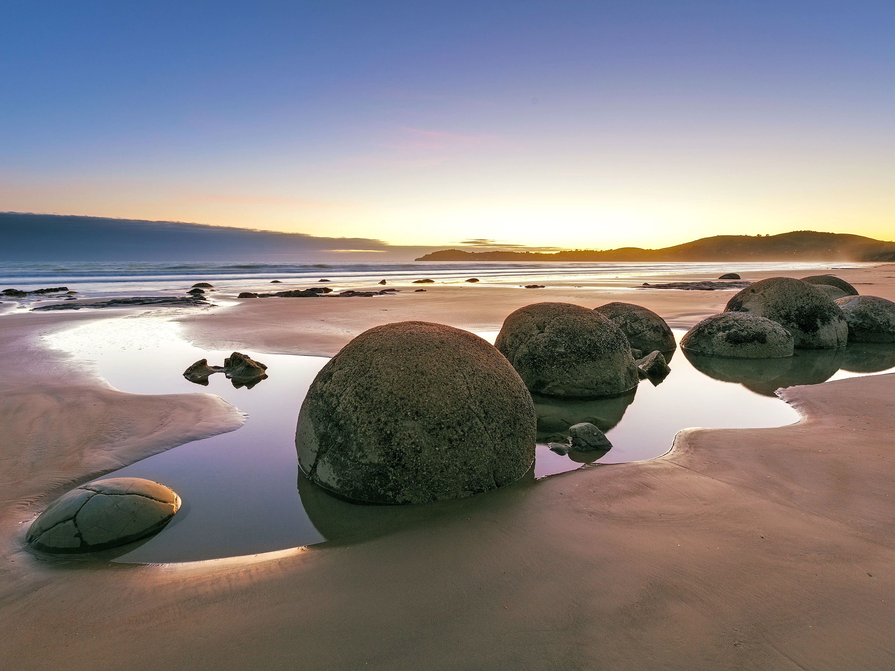 From Green Sands to Glowing Surf, These Beaches Are One of a Kind ...